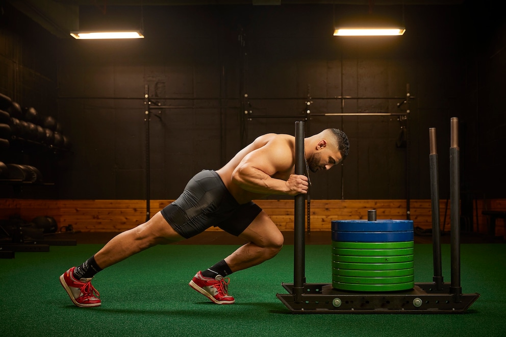 What Does Sled Pushing Offer Compared to Other Leg Workouts?